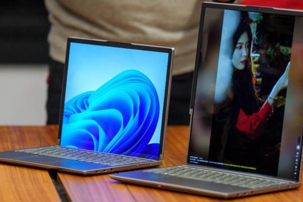 直击MWC2023 | 把笔记本屏幕“卷”起来，联想展示世界首款卷轴屏笔记本-36氪